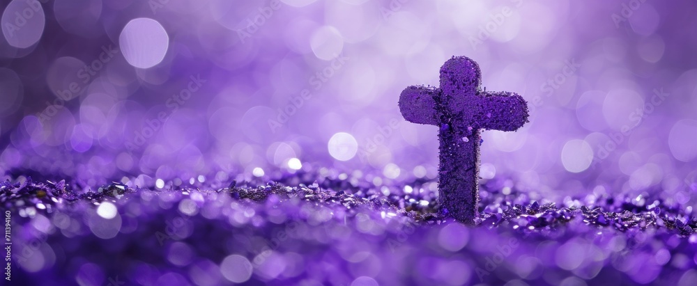An artistic Ash Wednesday banner featuring a cross adorned with purple ...