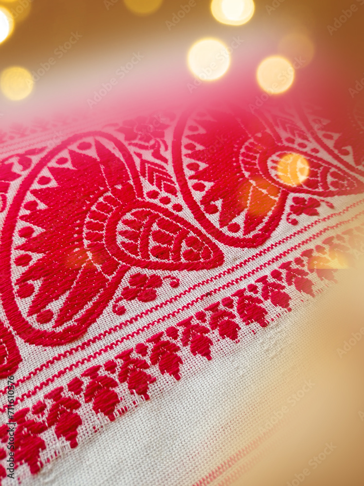 Gamosa or gamusa is a traditional textile pattern from Assam. It is a ...