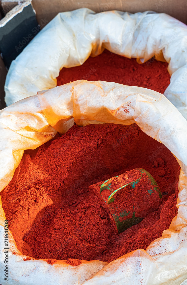 Red smoked paprika background. bags of La Vera paprika for sale at a ...