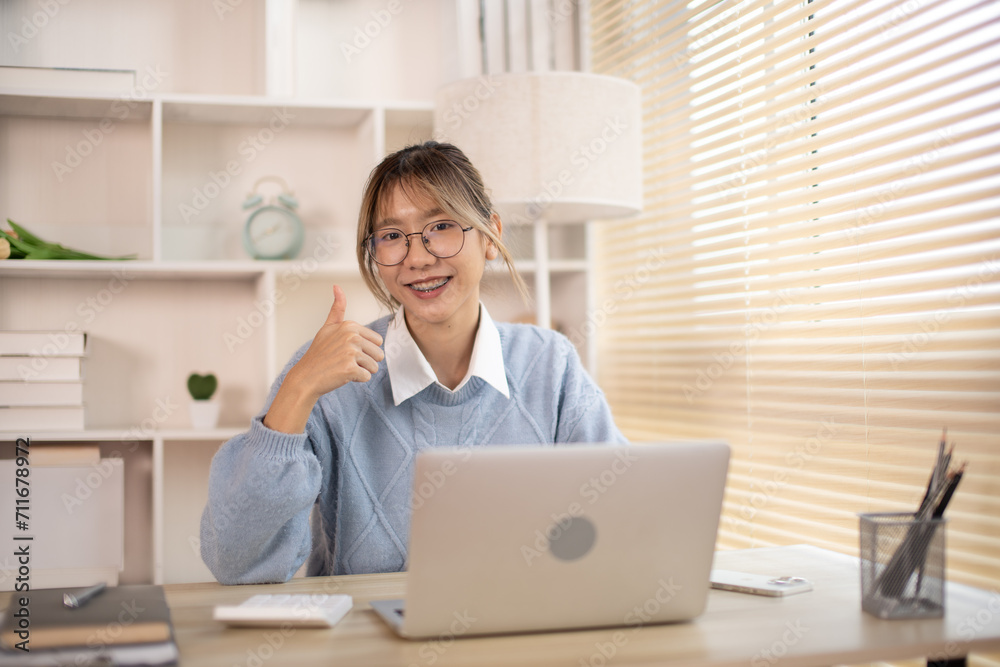 Thumbs up, Woman typing in front of a laptop, Hand pressing laptop ...