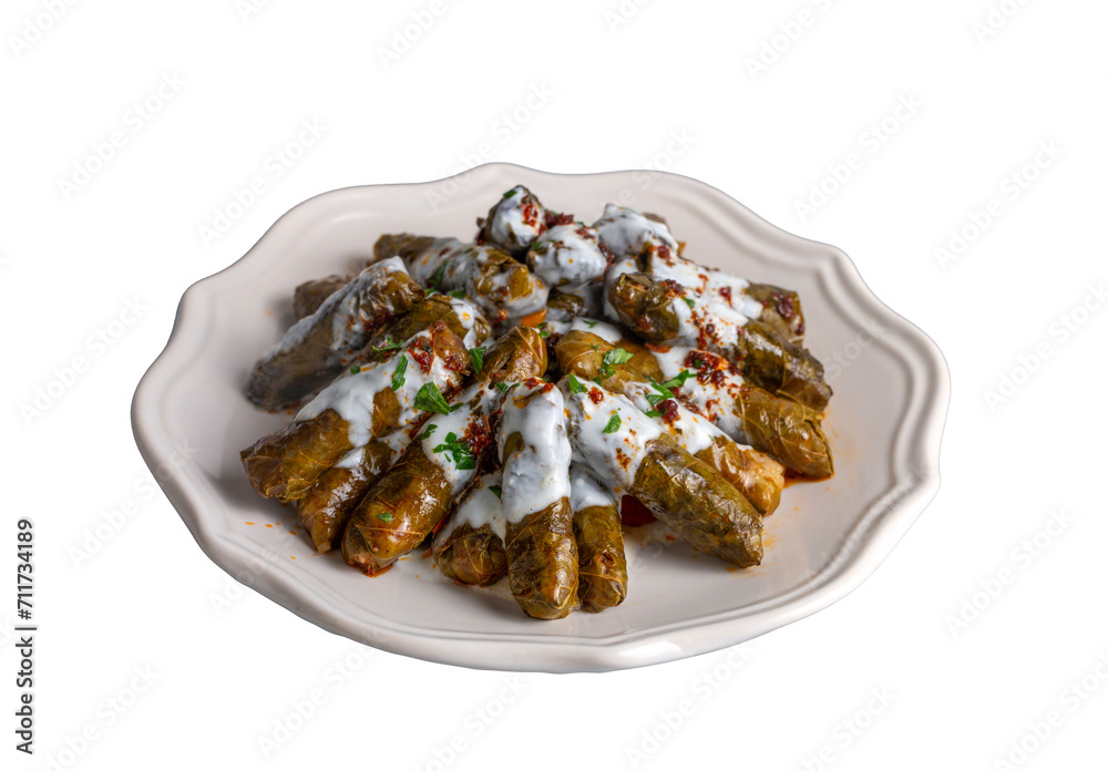 Delicious dolma (sarma) stuffed grape leaves rice, white yogurt sauce ...
