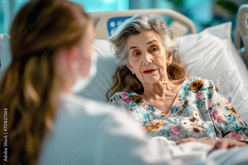 Friendly Professional Female Doctor Meeting An Elderly Patient On A ...