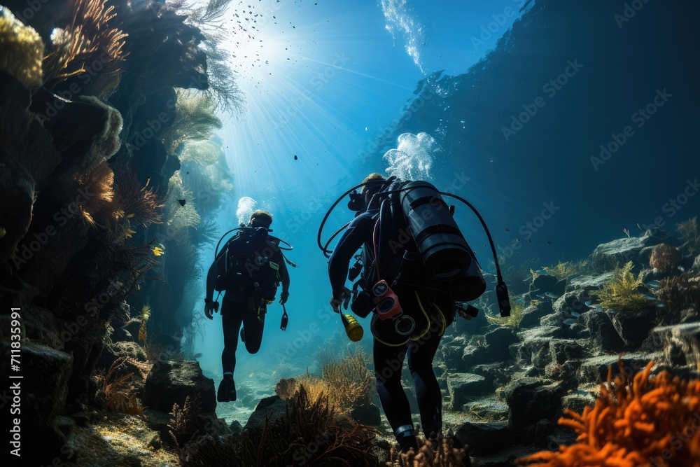 Exploring the hidden depths of the ocean, scuba divers glide through ...