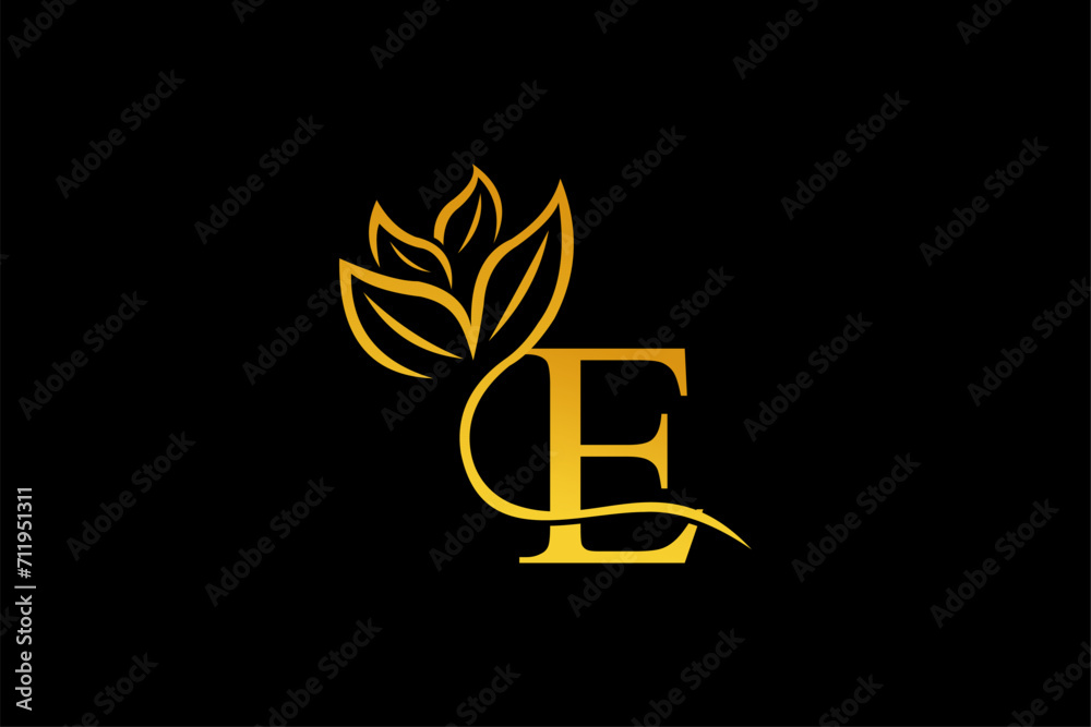 letter E logo design with luxurious gold and elegant floral ornaments. monogram E. icon E ...