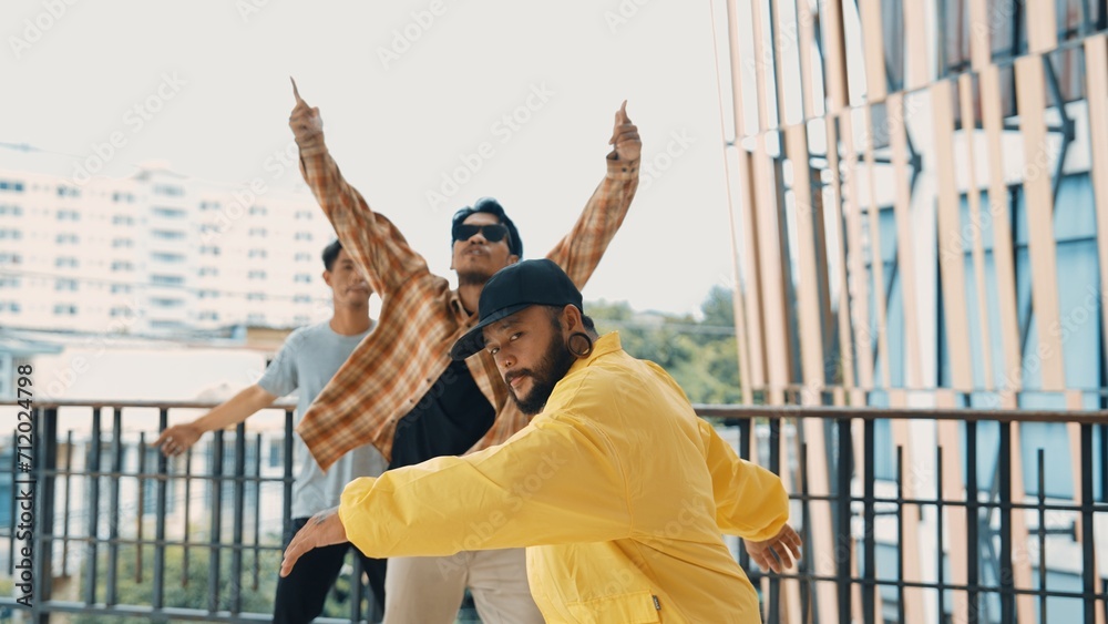 Hip hop team dance break dance while multicultural friend surrounded ...