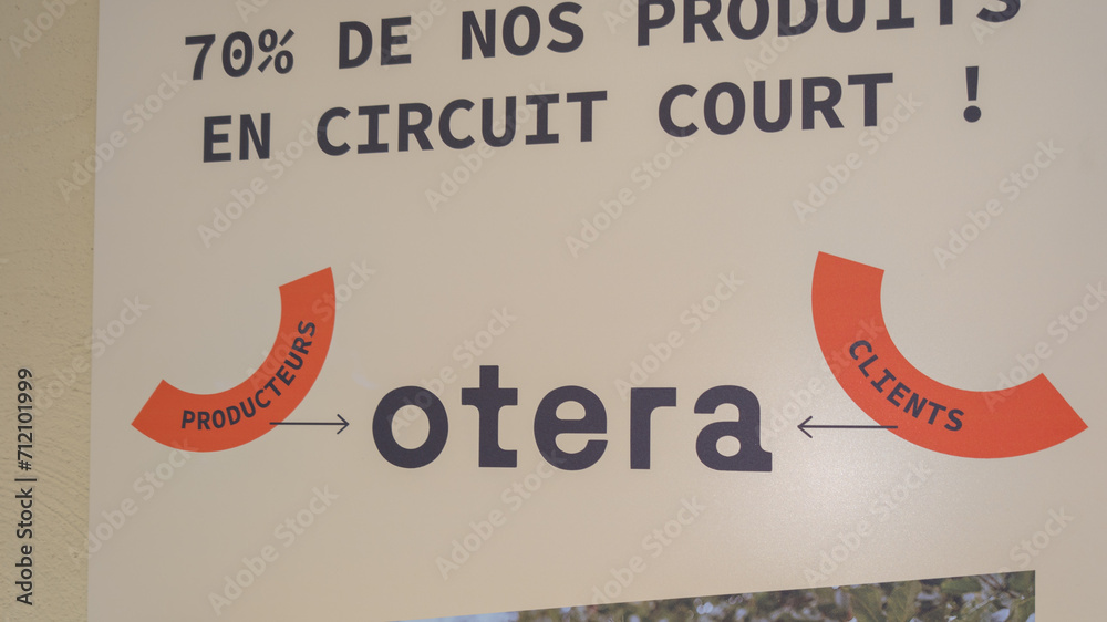 Otera logo sign and brand text on shop chain wall entrance facade short ...