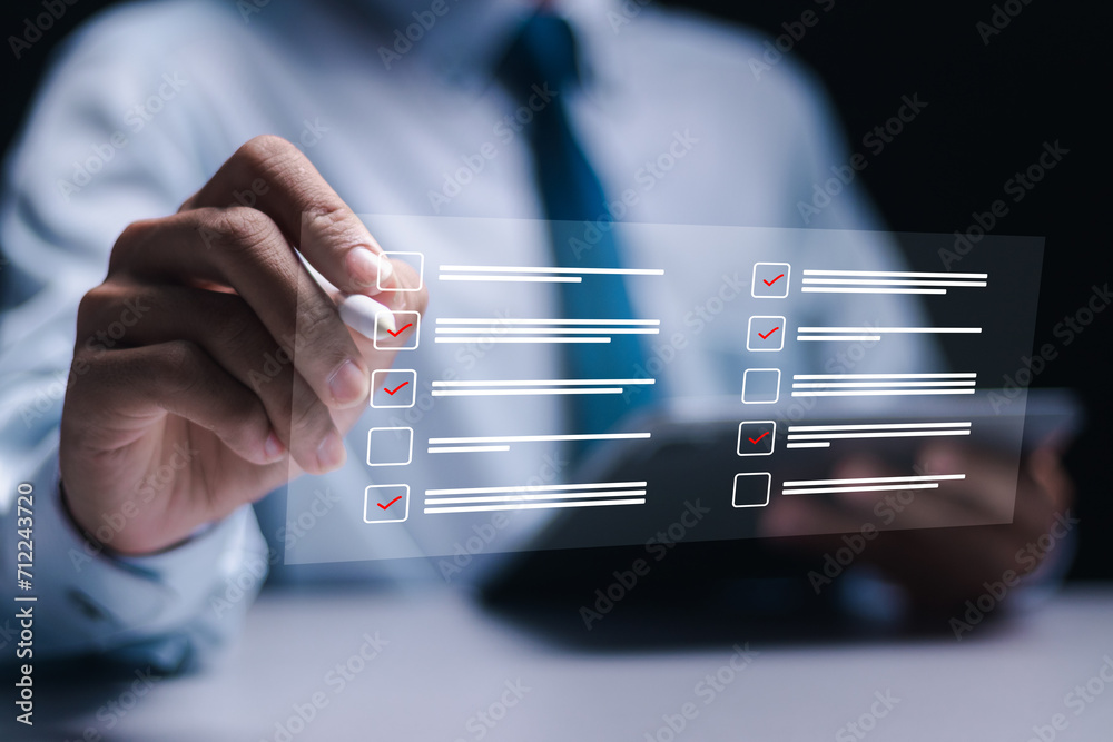 Online exam concept. businessman use pen choose correct answer in test ...