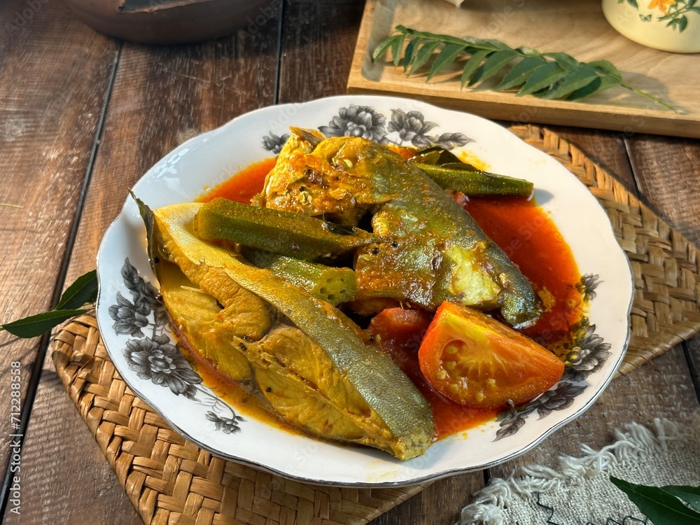 Foto de fish head curry or known as kari kepala ikan bawal is a famous ...