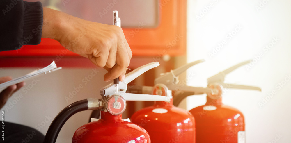 Engineer check fire suppression system,check fire extinguisher tank in ...