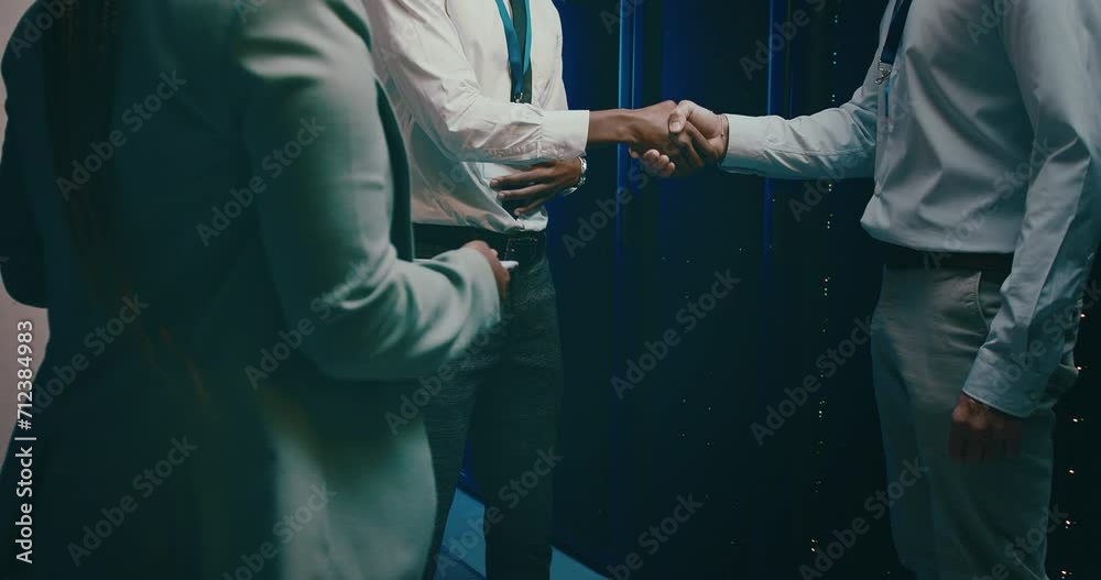 People, shaking hands and server room success, onboarding or cyber ...