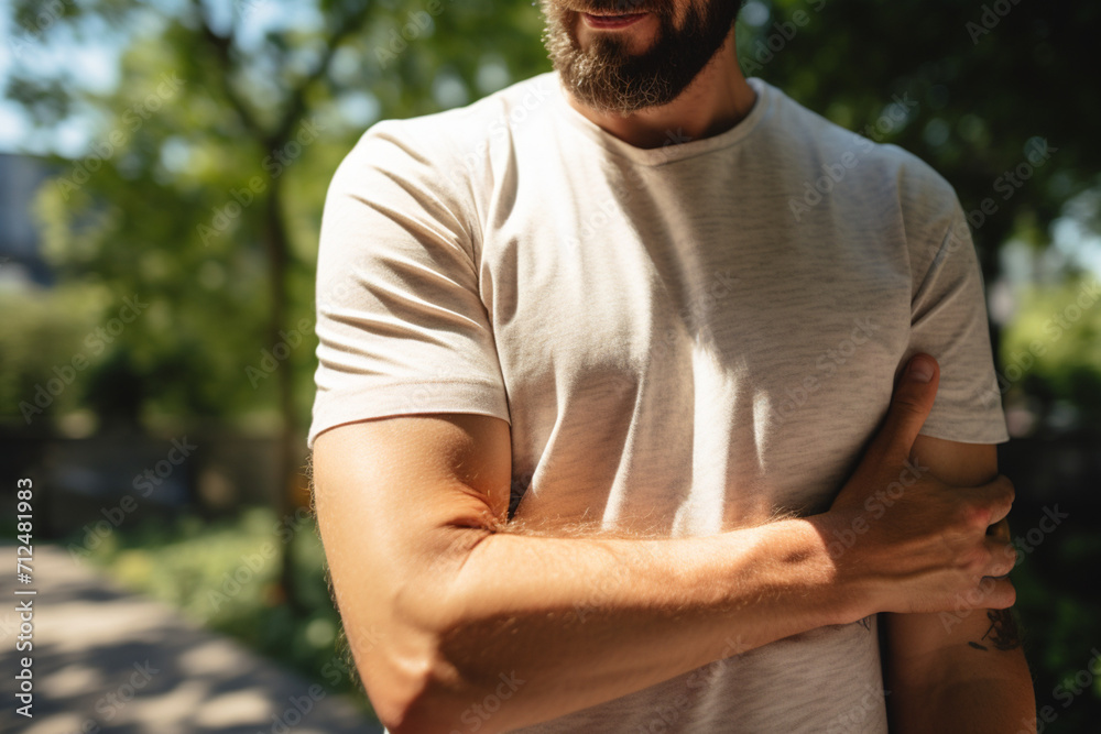 Man, joint pain and elbow arthritis in outdoor closeup in summer ...