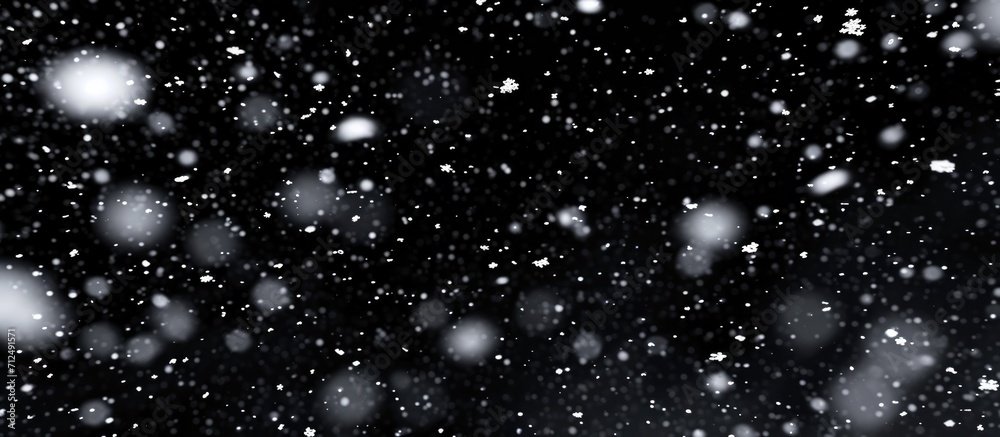 Looping animation of snowfall against a black backdrop, with ...