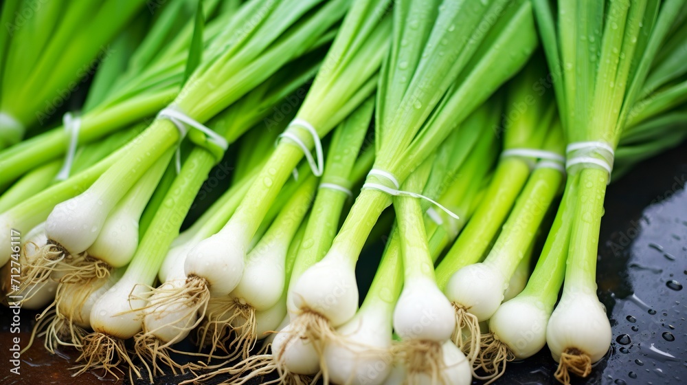 Bundles of green onions for sale at the produce market. Green onion ...
