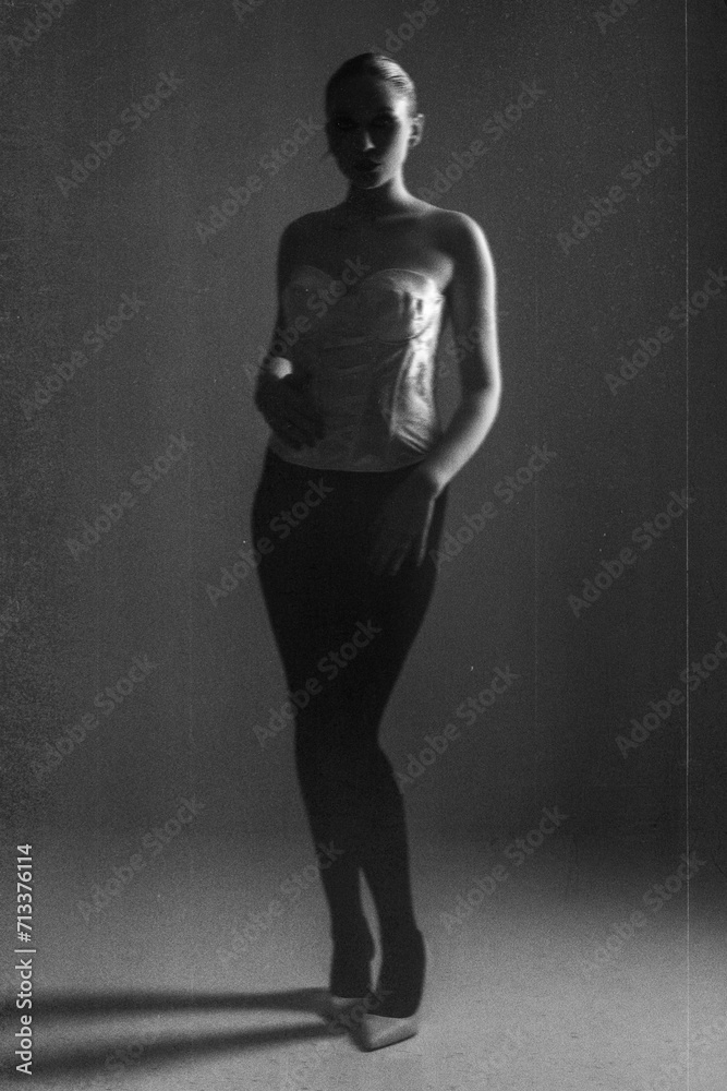 Beautiful woman full body silhouette portrait. Part of model covered in ...