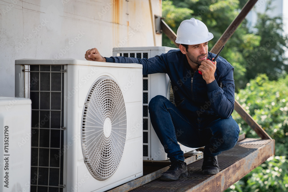 Engineers is checking the air conditioning cooling system of a major ...
