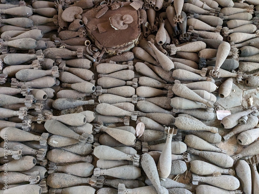 unexploded land mines and cluster bombs remains picked up all around ...