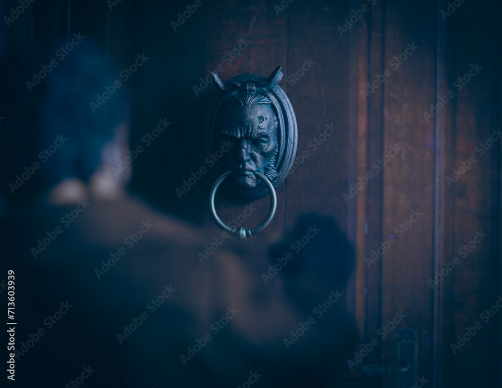 NEW YORK USA, JAN 29 2024: Jacob Marley door knocker visiting Ebenezer ...