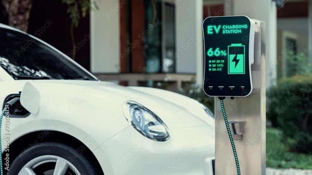 Electric car recharging from home charging station by futuristic EV ...
