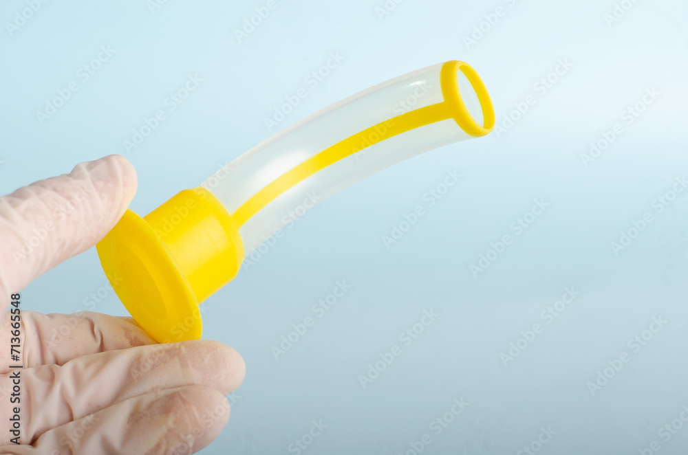 Guedel cannula. Orotracheal intubation, medical instruments, held in ...