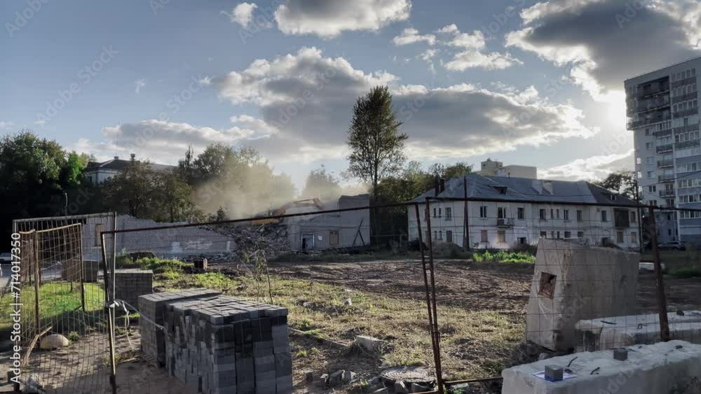 excavator demolishes buildings, demolition of buildings, construction ...