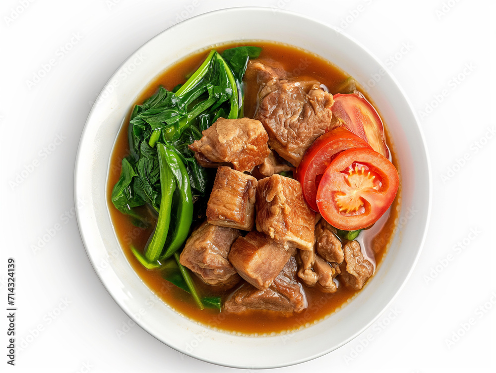 Pork Sinigang, Filipino Food in white plate and white background Stock ...