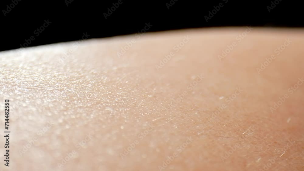 Explore the arm's skin with macro video footage, revealing its complex ...