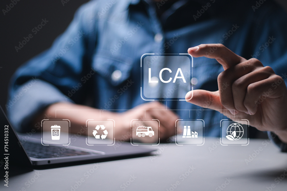 LCA or Life cycle assessment. Person use laptop with virtual screen of ...
