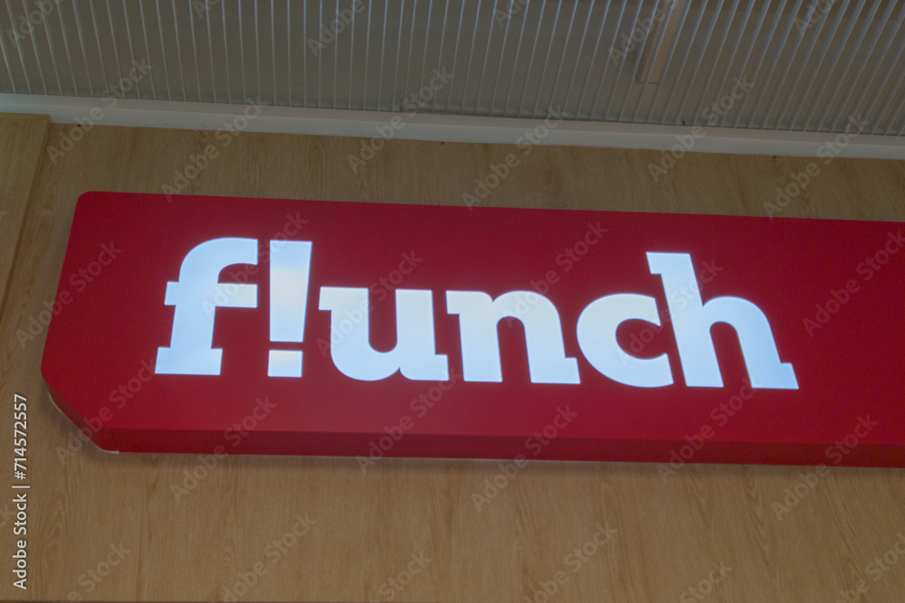flunch f! building facade restaurant sign text and brand logo operated ...
