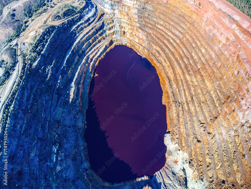 Aerial drone view of Corta Atalaya with mining levels at open mine pit ...