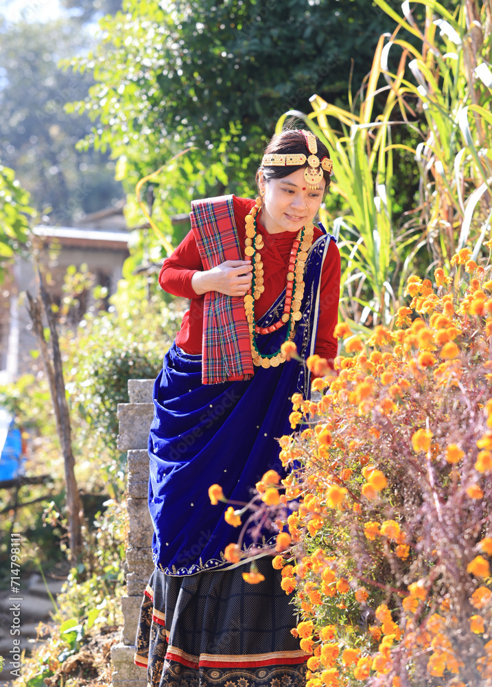 a girl with Gurung traditional dressing a Gurung village in Ghandruk ...