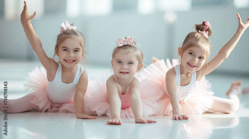 Little ballerinas girls and boys doing splits on the white floor, copy ...