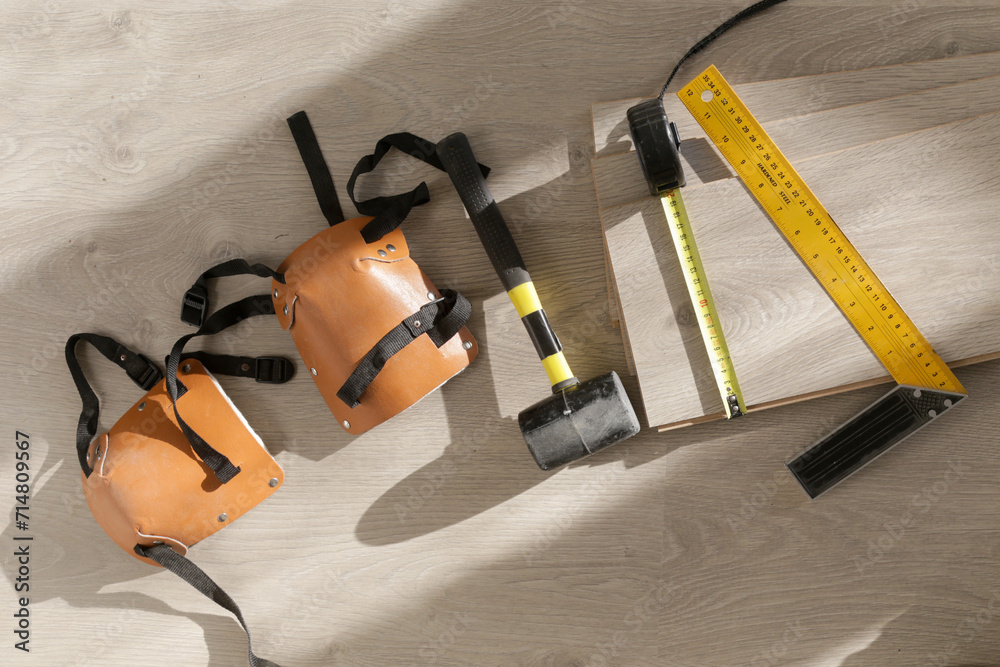 Rubber hammer, ruler with angle bar, tape meter, jig saw and other ...