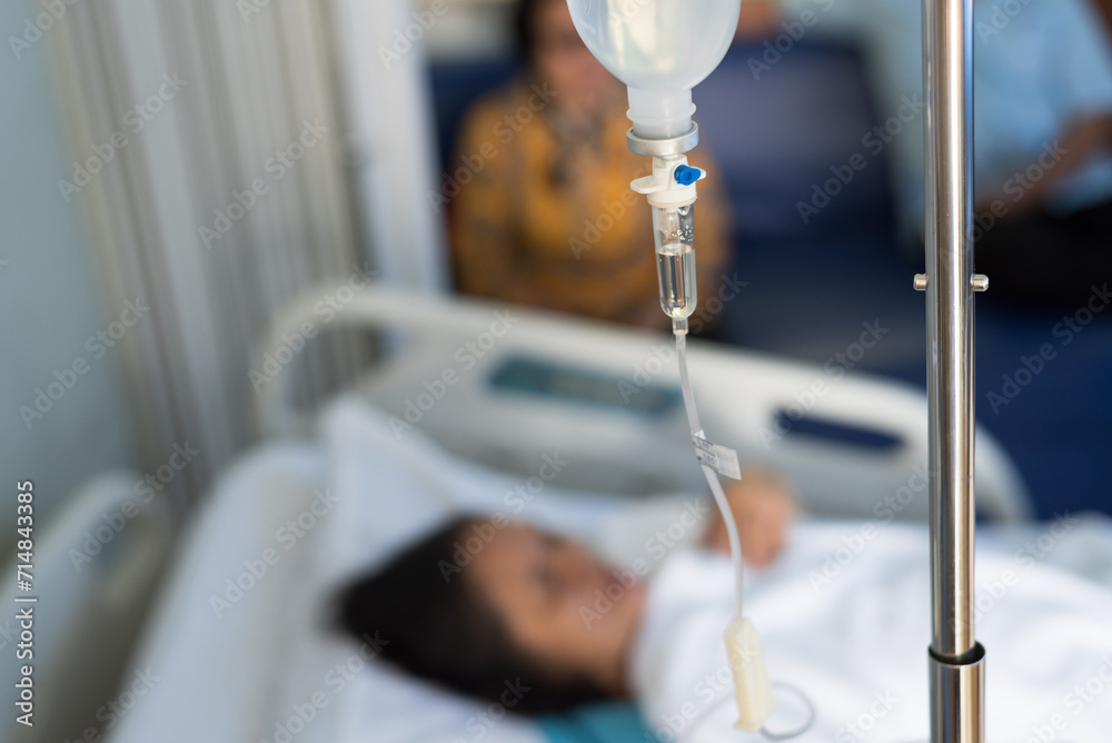 Close up set iv fluid intravenous drop saline drip in hospital room ...