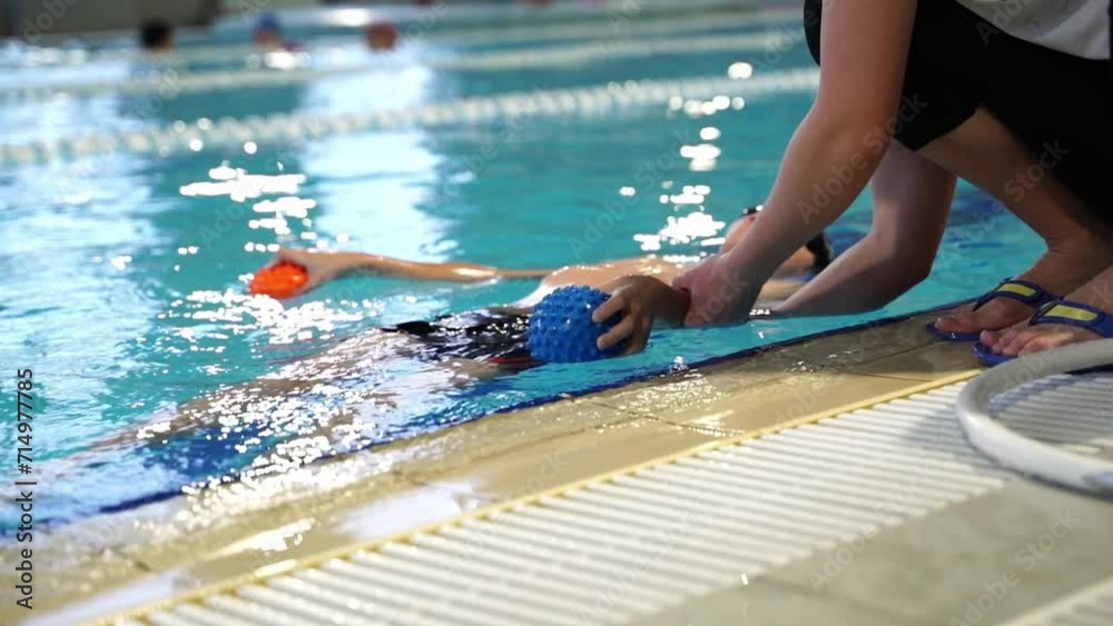 swimming pool training lesson for kids. little boy child learning to ...