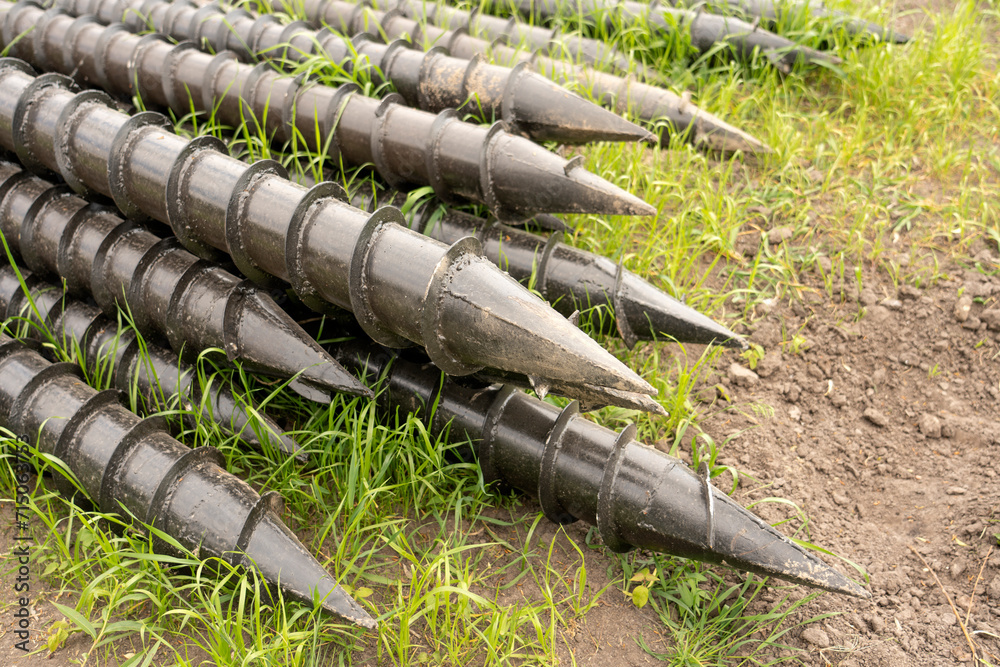 Screw piles for terrace foundations. Geo screws are steel round ...