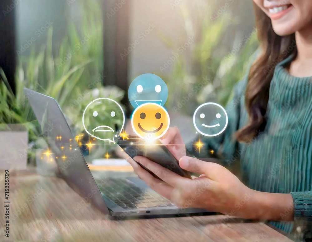 Women use smartphones and press face smile emoticon icon on virtual ...