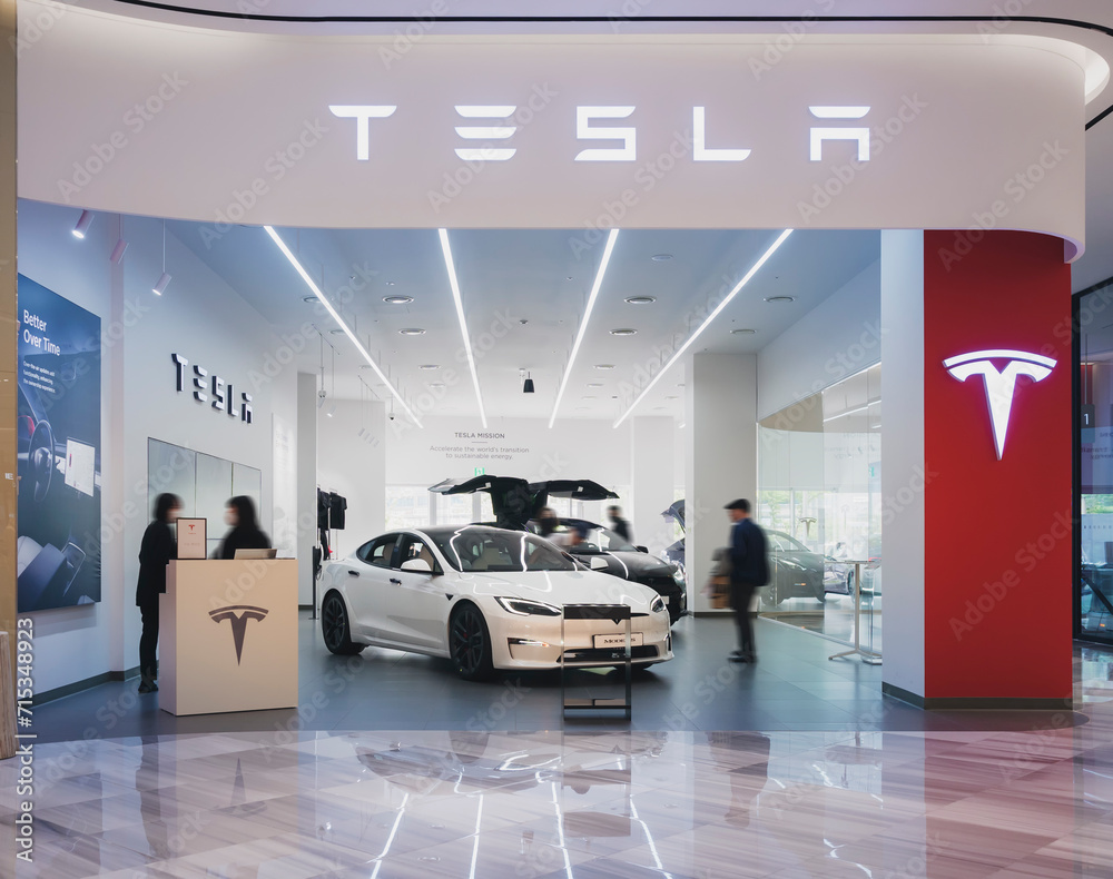 Tesla car showroom with logo sign Automotive Clean Energy Electric ...