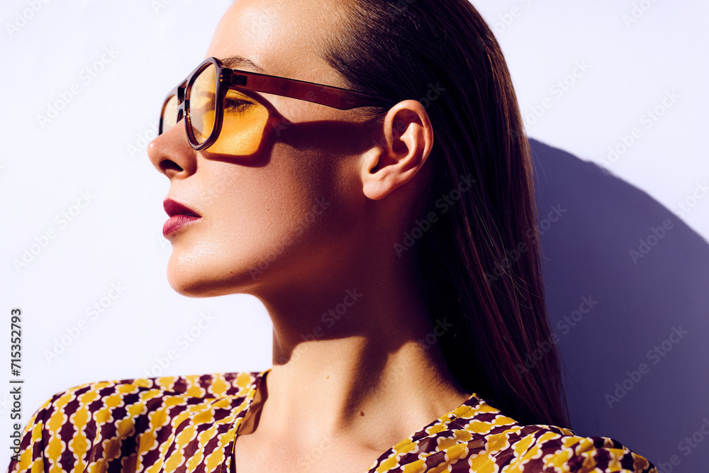 Profile fashion model portrait. Square shape yellow sunglasses. Young ...