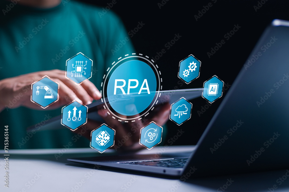 RPA concept, Businessman use laptop with virtual screen of RPA icons for Robotic process ...