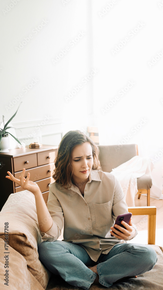 Digital Frustration. Perplexed and irate young woman encounters issues ...