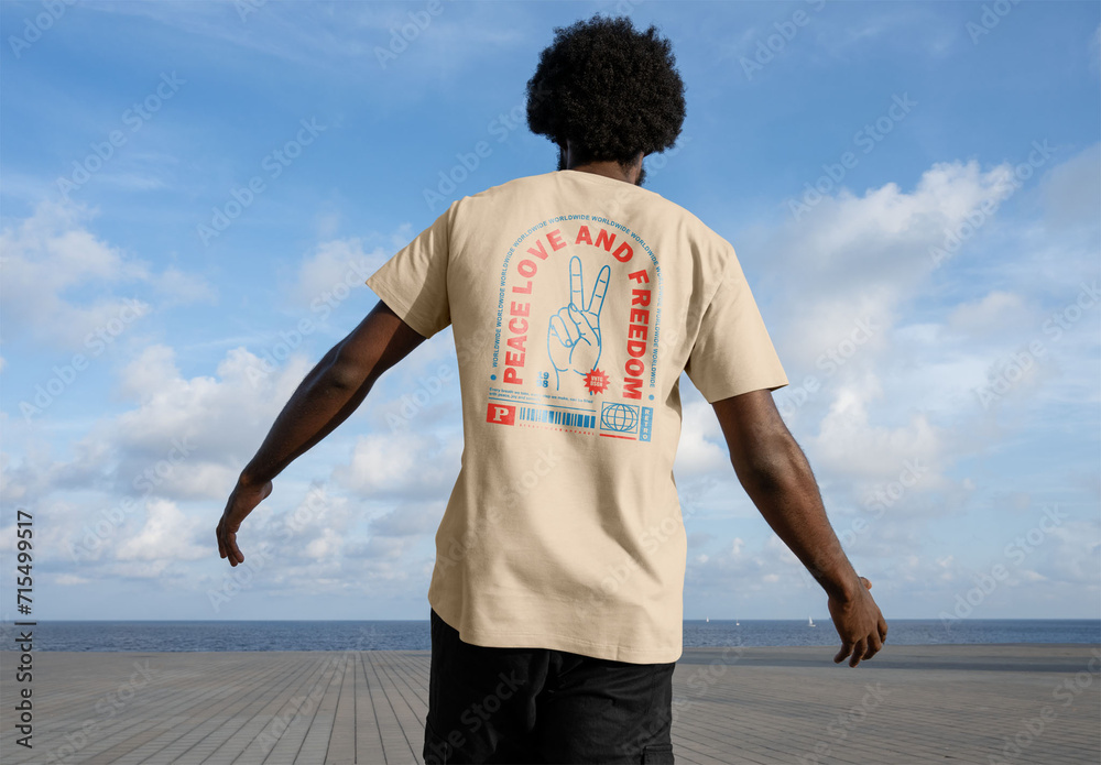 Mockup of man wearing customizable t-shirt, rear view Stock Template ...