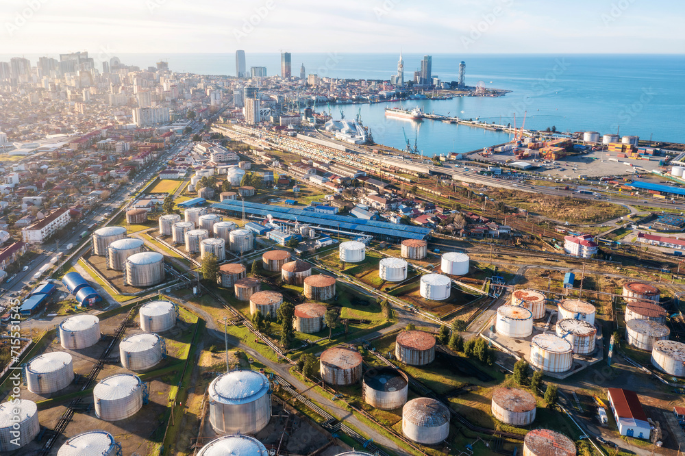 Aerial drone view of oil and gas terminal with steel storage tanks of ...