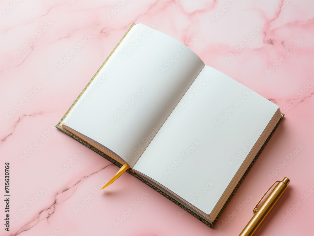 Minimalist open diary with clean pages. Pastel pink in the background ...