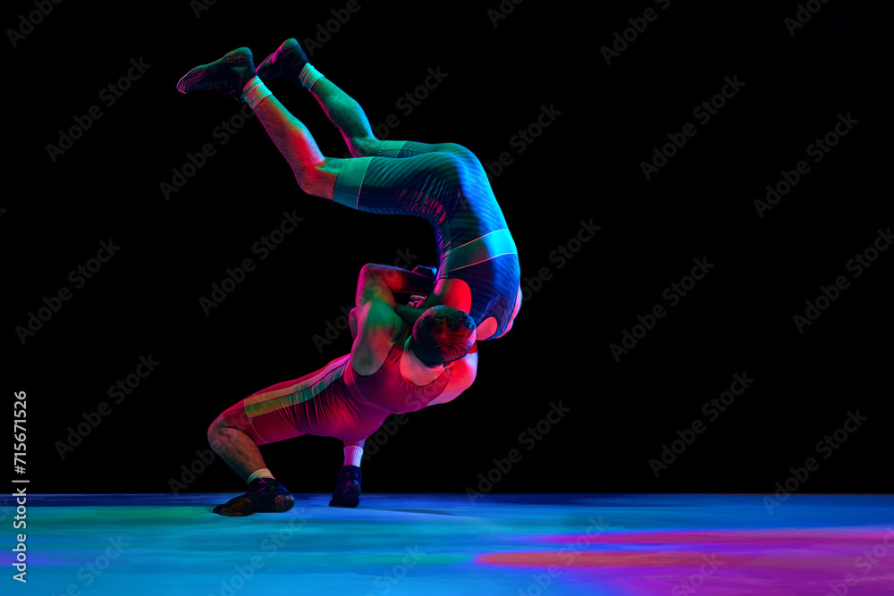 Two young man, professional sportsman of freestyle wrestling in uniform ...