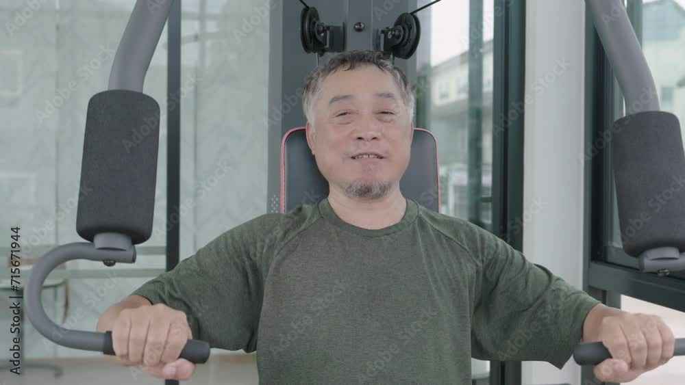 Vidéo Stock Elderly, Retired or Senior Asian man using pull-down ...