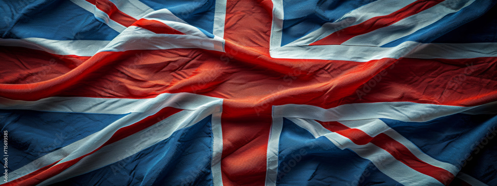 The Union Jack flag is presented in a detailed fabric texture ...