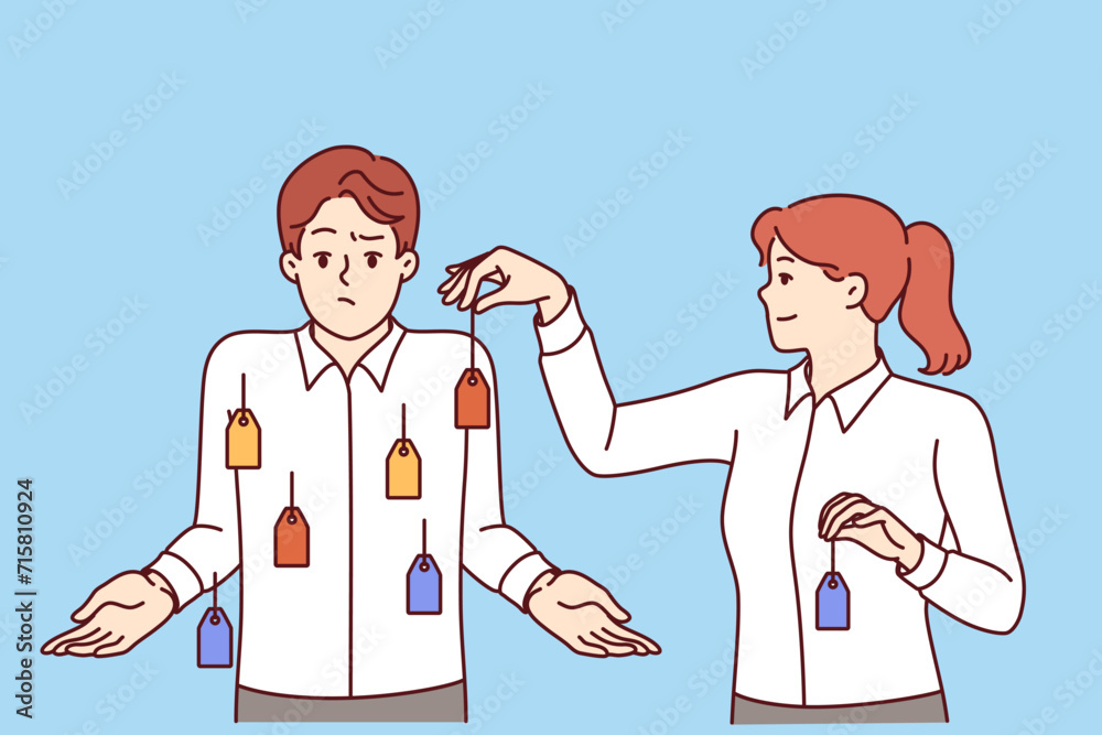 Woman boss tagging confused man employee, for concept of using ...