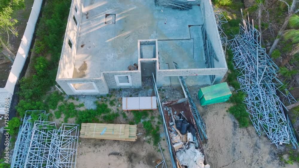 New house under construction. Aerial view of incomplete frame of ...