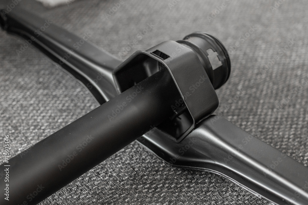 Freshly painted, powder coated, torque tube of an oldtimer car. Detail ...