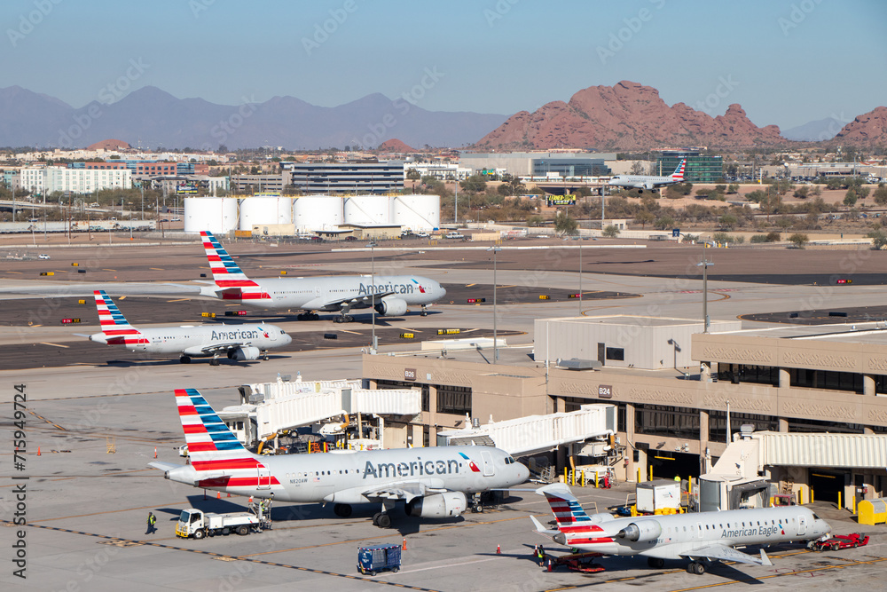 American Airlines aircraft at terminal gates and taxiways at Phoenix ...